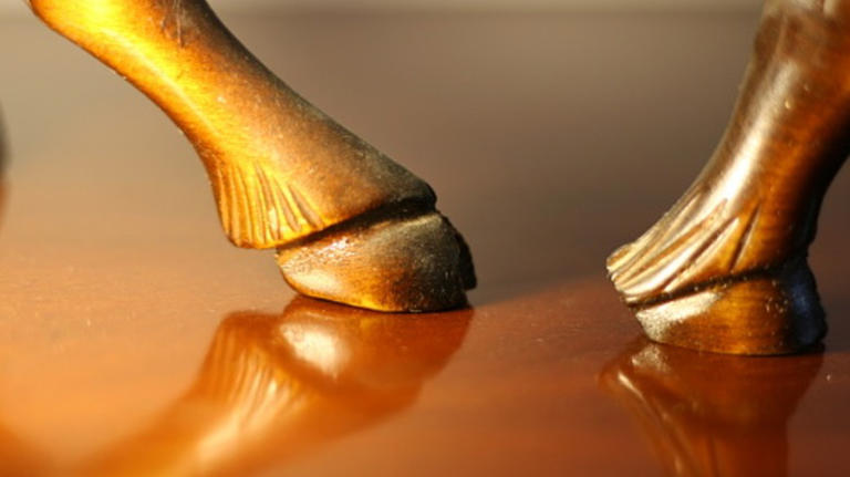 What does the weird animal feet on your old furniture really mean?