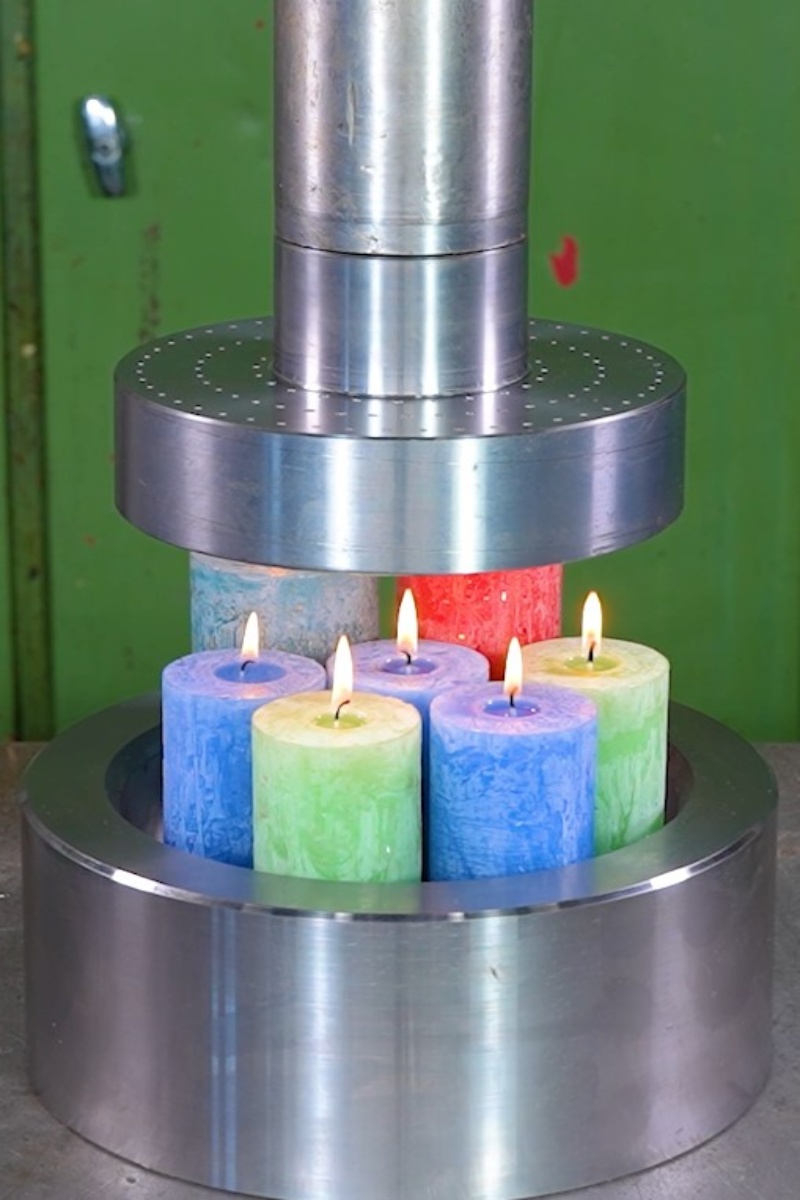 Hydraulic press crushes colorful candles