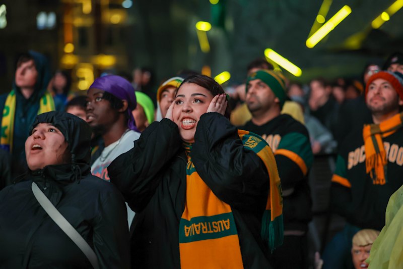 Sodden fans lament 'horrible' ref decisions as flares go off at Fed Square