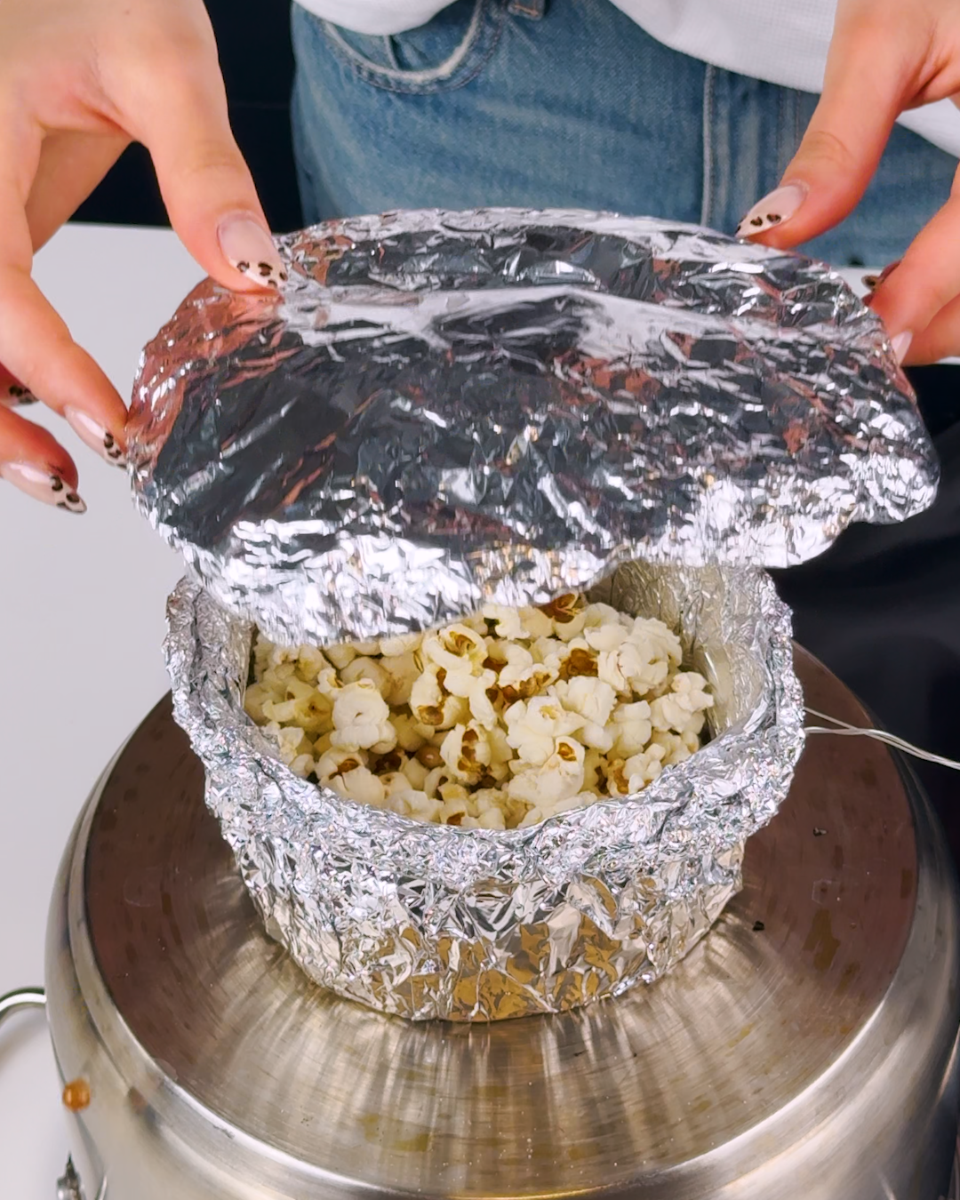 You'll love this new popcorn hack using aluminum foil! 😋🍿