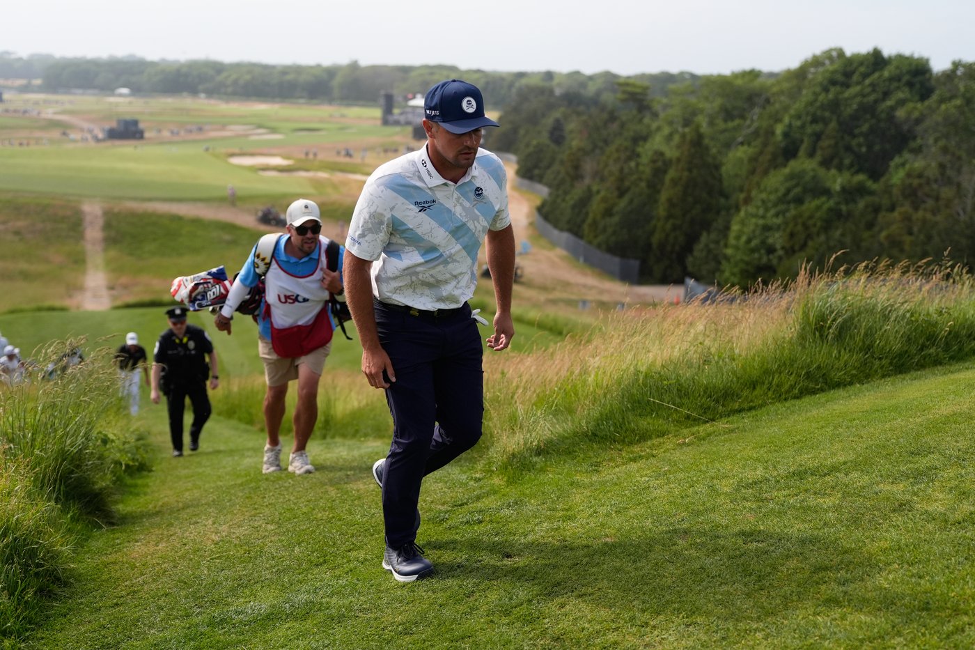 DeChambeau sputters and leads parade of former champions to miss cut at ...