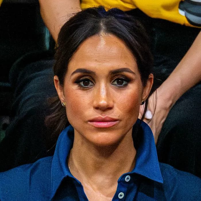 Social media users accuse Meghan Markle of being a 'fraud' as she ...