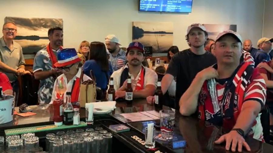 Soccer fans pack into Riser Tavern and Grill for World Cup watch party