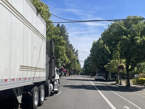 Semi-truck knocks down 7 power poles in Beaverton; 100+ lose electricity