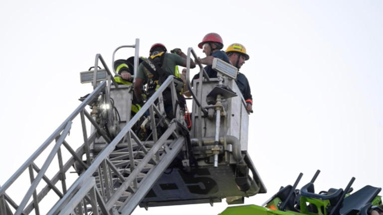 Over a dozen stranded after popular 'Wave Twister' ride gets stuck at ...