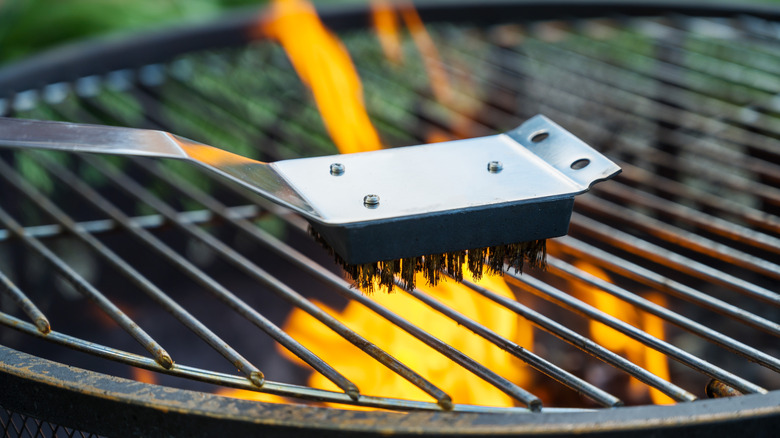 Can you clean the outdoor grill if it's still hot?