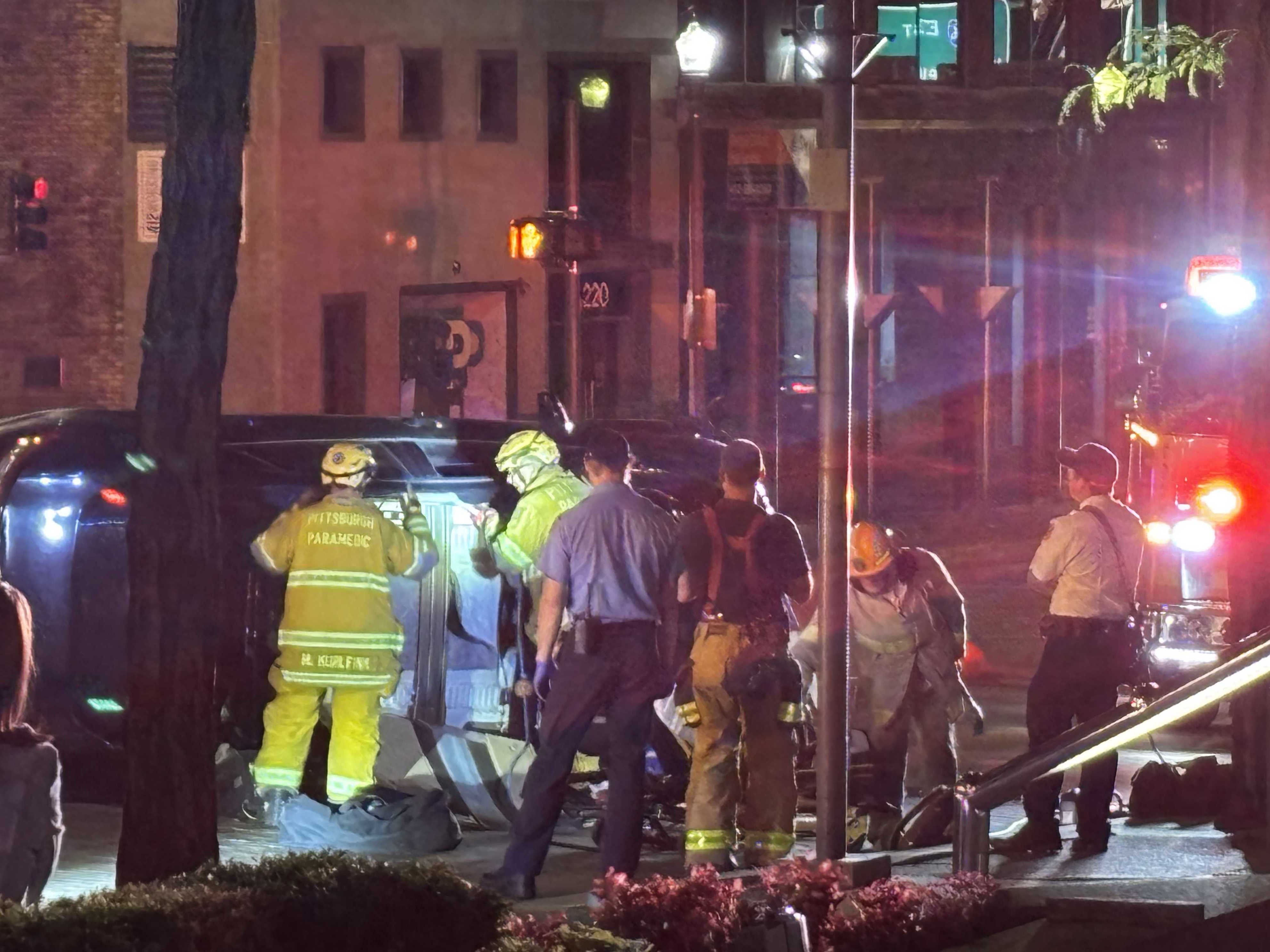 Vehicle rolls onto side in downtown Pittsburgh crash