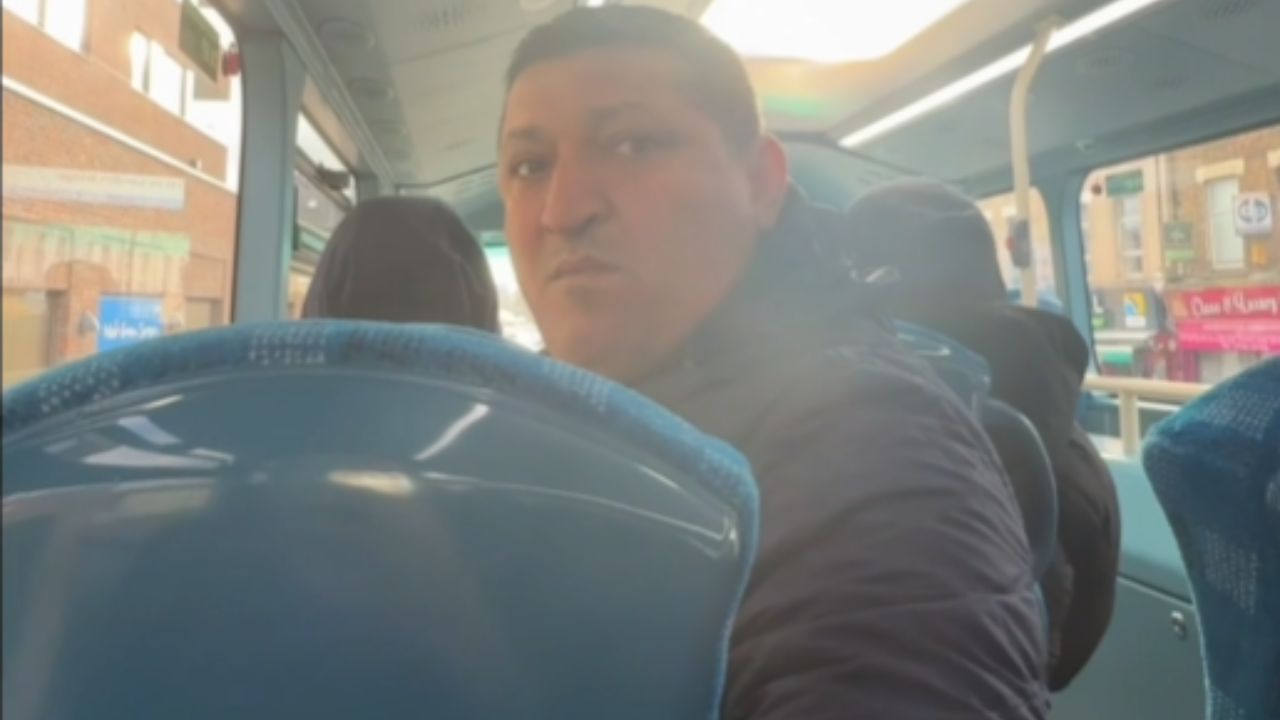 Boy pranks bus passengers by targeting their heads with water gun