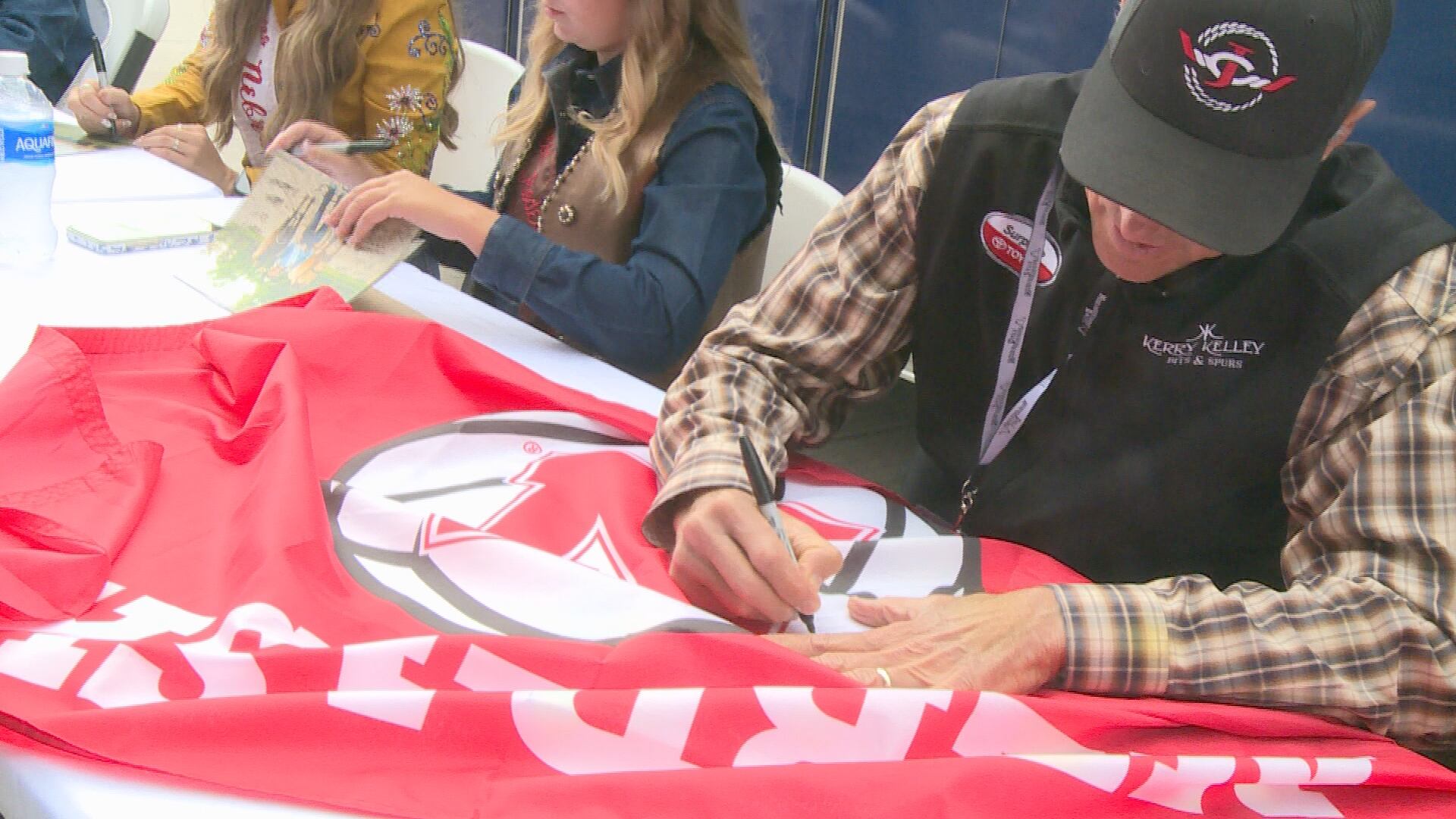 Former Nebraska volleyball coach John Cook meets fans at Buffalo Bill Rodeo