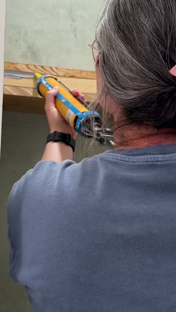 She totally transforms her small bathroom by doing this!