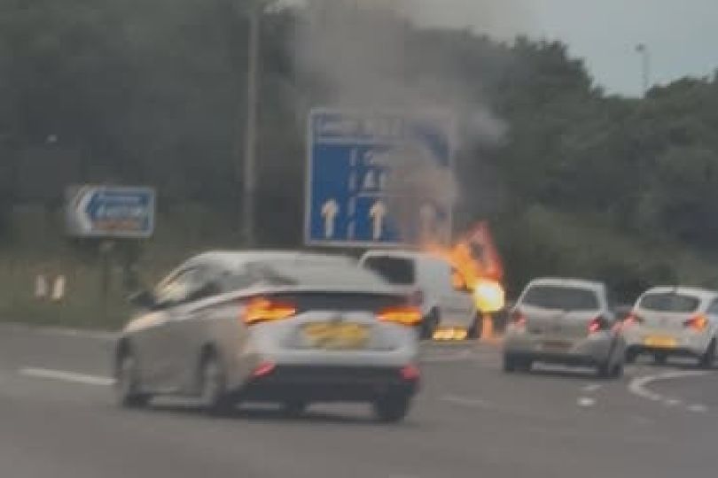 Firefighters descend on M62 junction after van bursts into flames