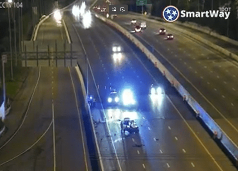 Driver flees after crashing into truck on I-240