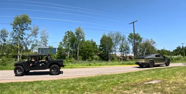 A 2024 Tesla Cybertruck took on 2004 diesel military Humvee in a tug-of ...