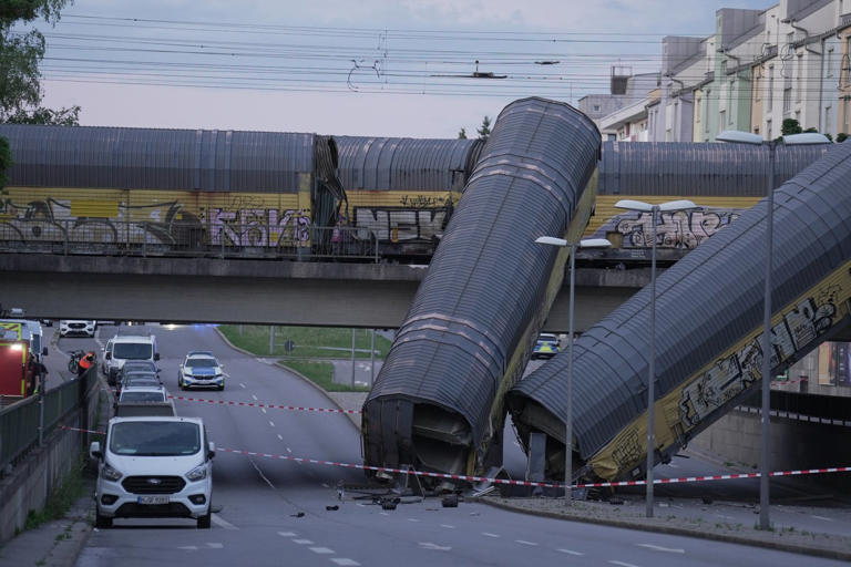 A freight trains' collision in Germany sends 2 wagons plunging off a ...