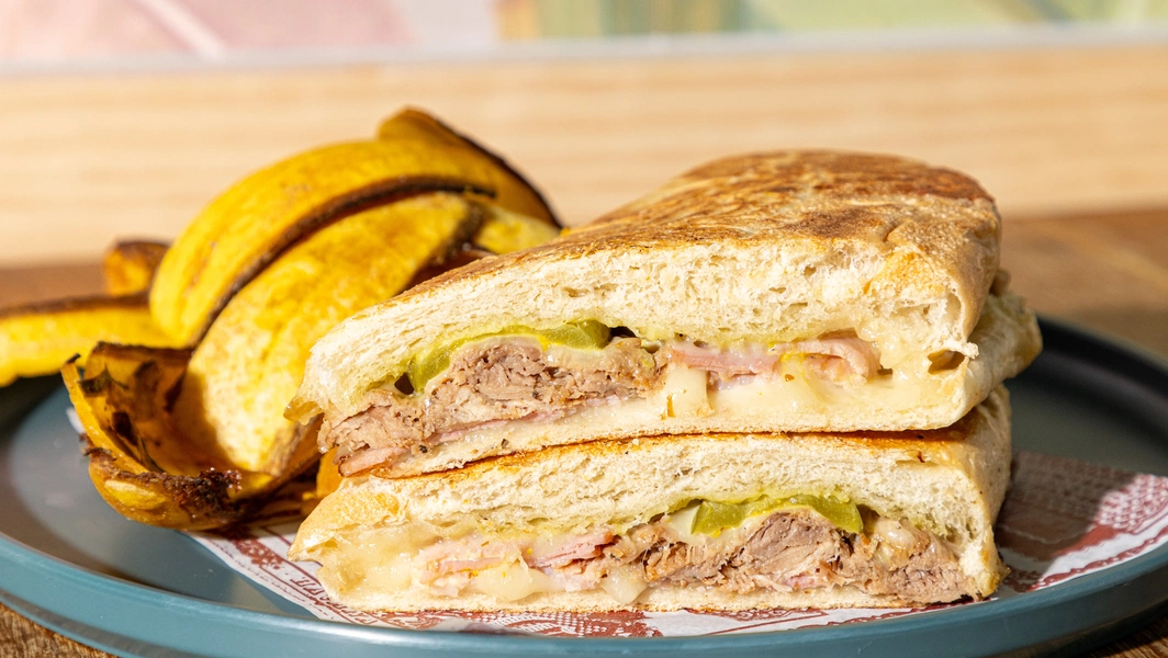 Cuban-style grilled cheese with mojo and classic fillings
