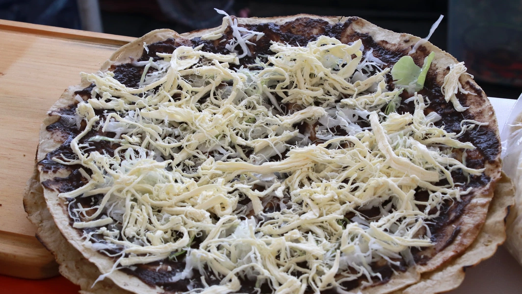 Origins, craft, and global reach of Oaxaca cheese