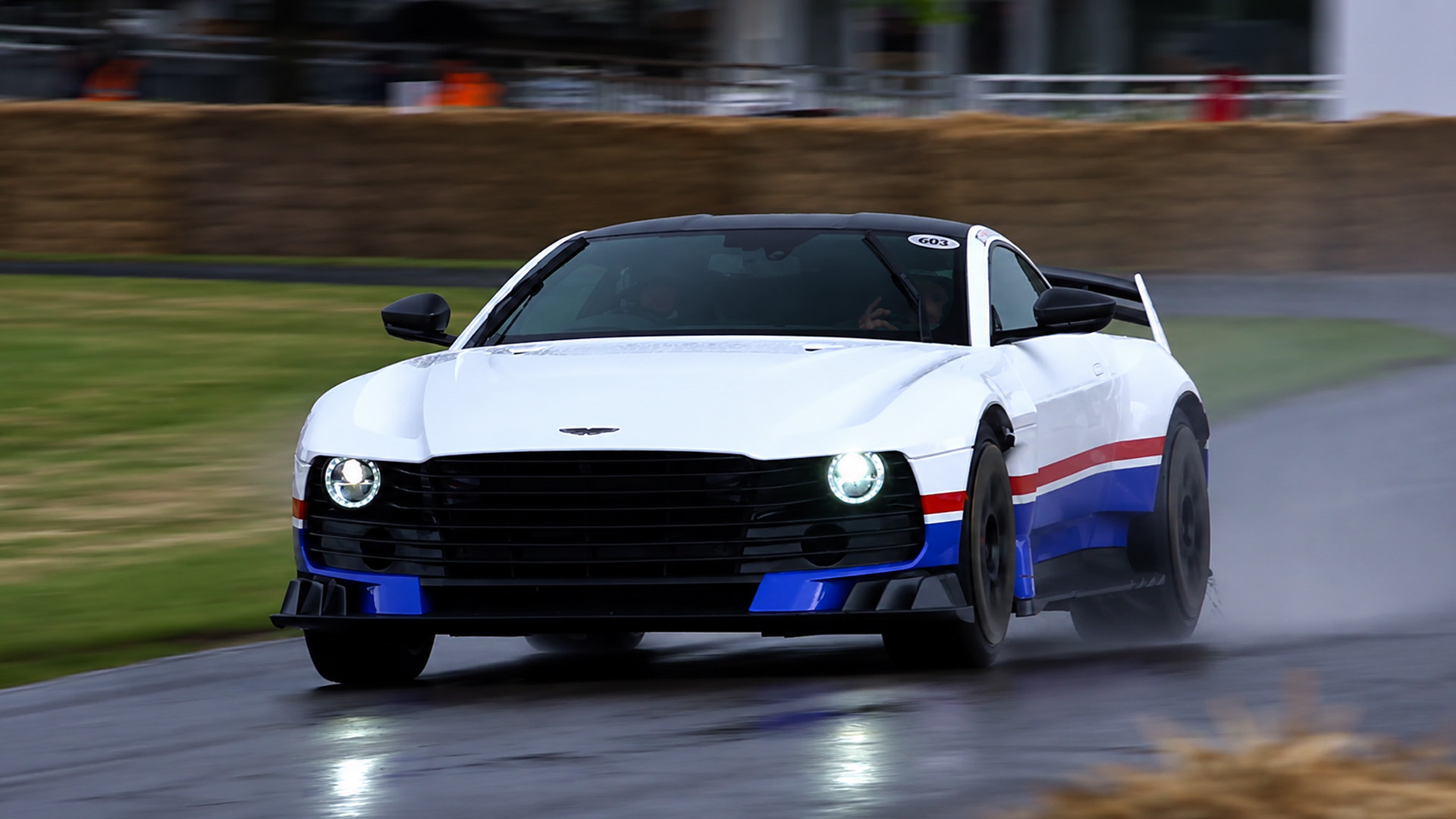 Rare Aston Martin Valiant pushes hard through rainy track conditions