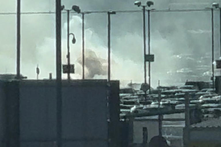 Fire crews tackle Edinburgh Airport vehicle fire as smoke billowed from ...