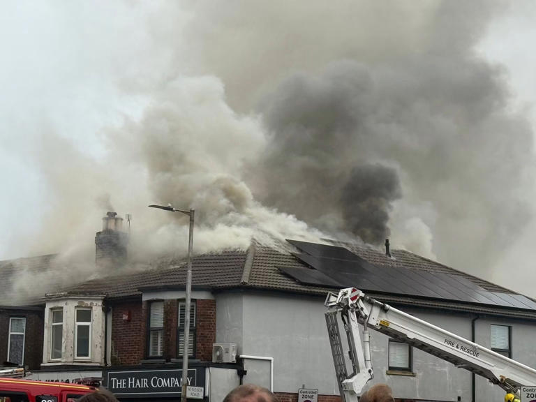 Smoke billows from flat in Cosham as firefighters battle blaze and ...