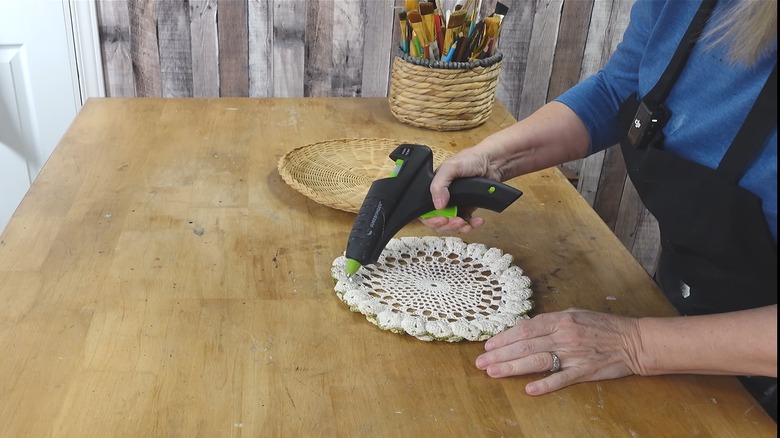 Turn vintage doilies and cardboard into a beautiful boho home decor piece