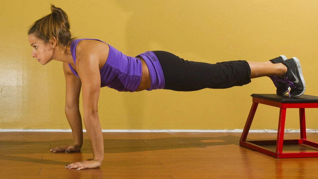 Dumbbell push-up variations for chest and core strength