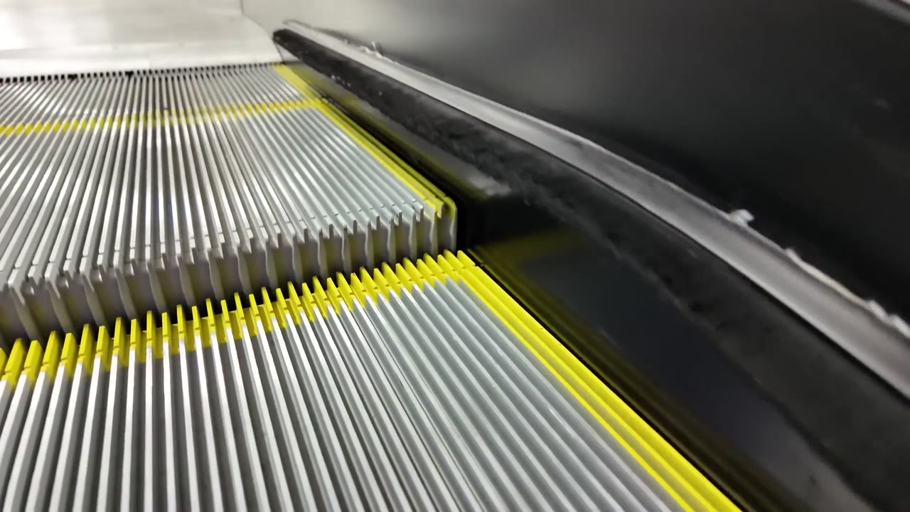 Watch what happens when an escalator breaks with 100 people on it