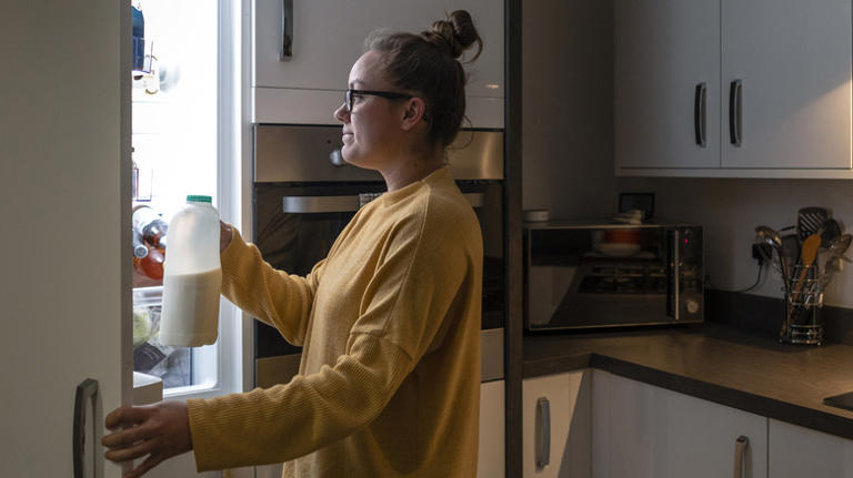 Warning signs your opened carton of almond milk isn't safe to drink
