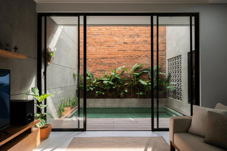 Rumah modern kontemporer super sejuk dengan unsur tanaman