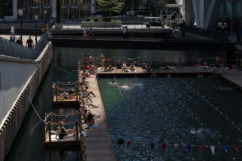 New East London lido photos show swimmers taking first laps in Canary Wharf