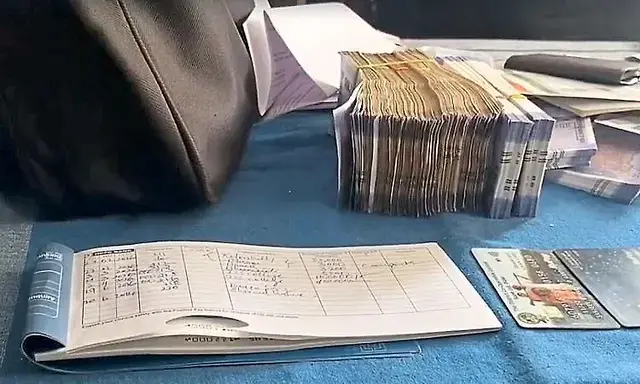 Cash bundles found with BRIMS lab technician during Upa Lokayukta visit ...