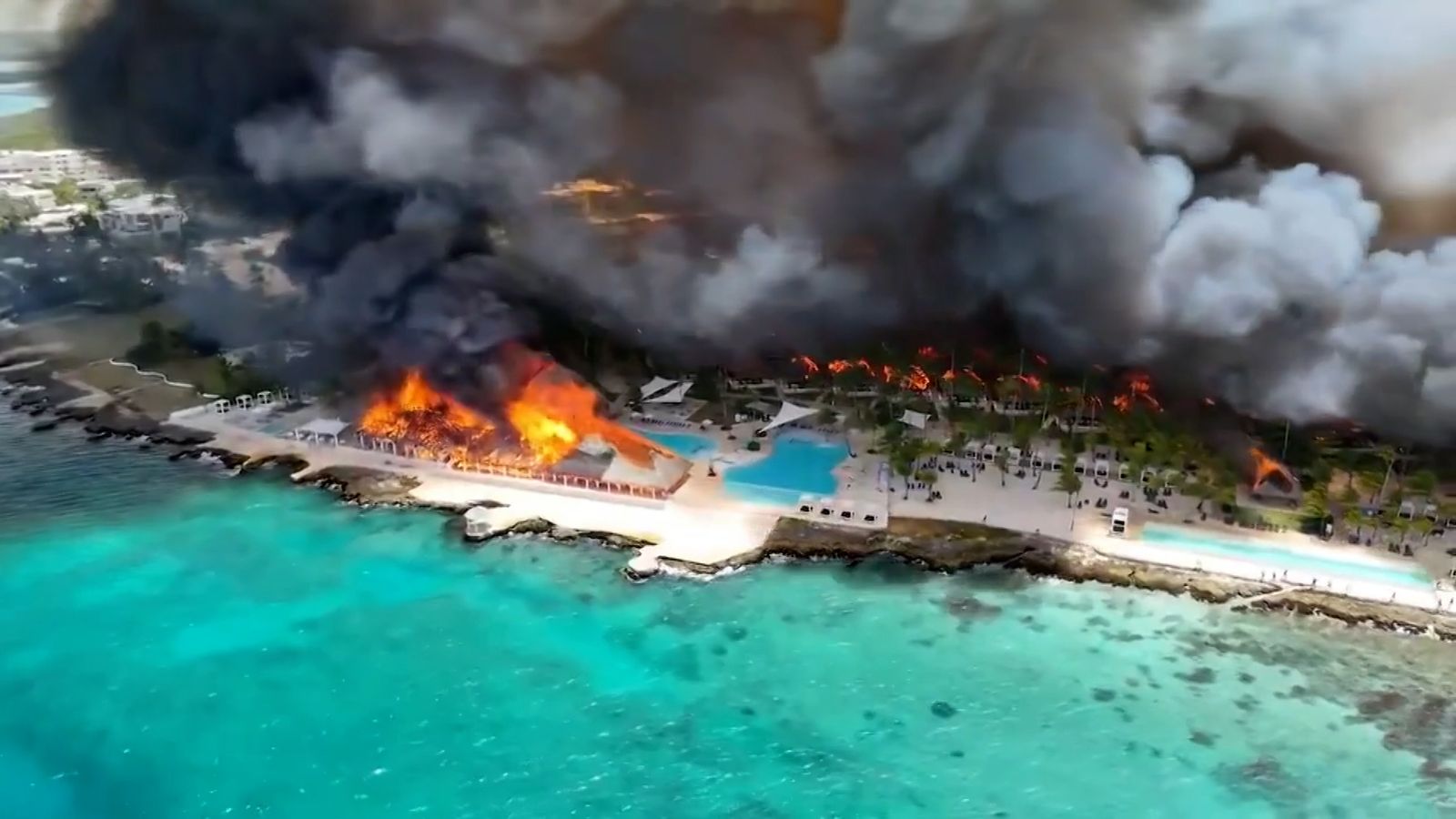 Deadly fire destroys luxury beach resort