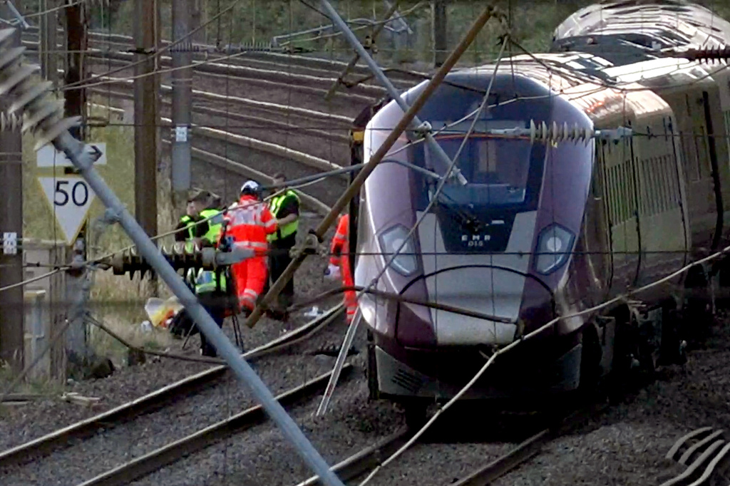 UK police probe cause of train collision that killed driver and left 9 ...