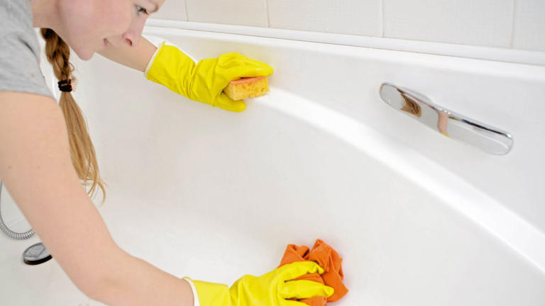 Why do I have pink mold in my bathroom, and how do I clean it?