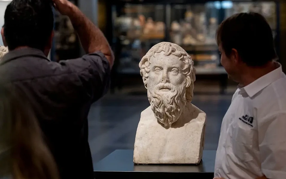 Two intact Roman busts found buried in ancient winepress