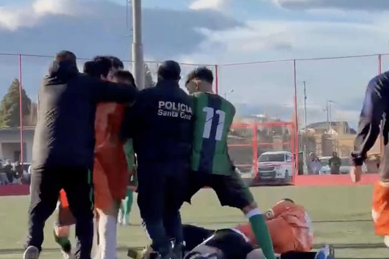Footballer punches and kicks referee over red card as player facing ...