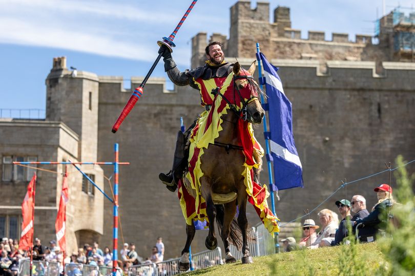 Bamburgh Castle hosts live jousting as knights battle in front of sell ...
