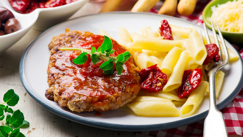 Jarred pasta sauce is all you need to take pork chops from boring to bold