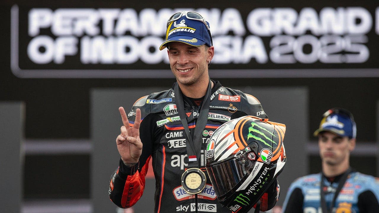 MotoGP championship leader hit with a one-race ban after slapping a ...