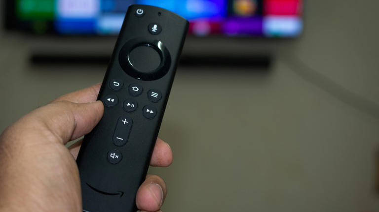 What does the flashing red light mean on a Fire TV Stick remote?