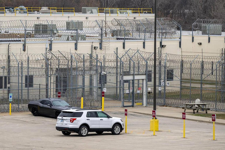 Immigration crackdown lifts private-prison stocks