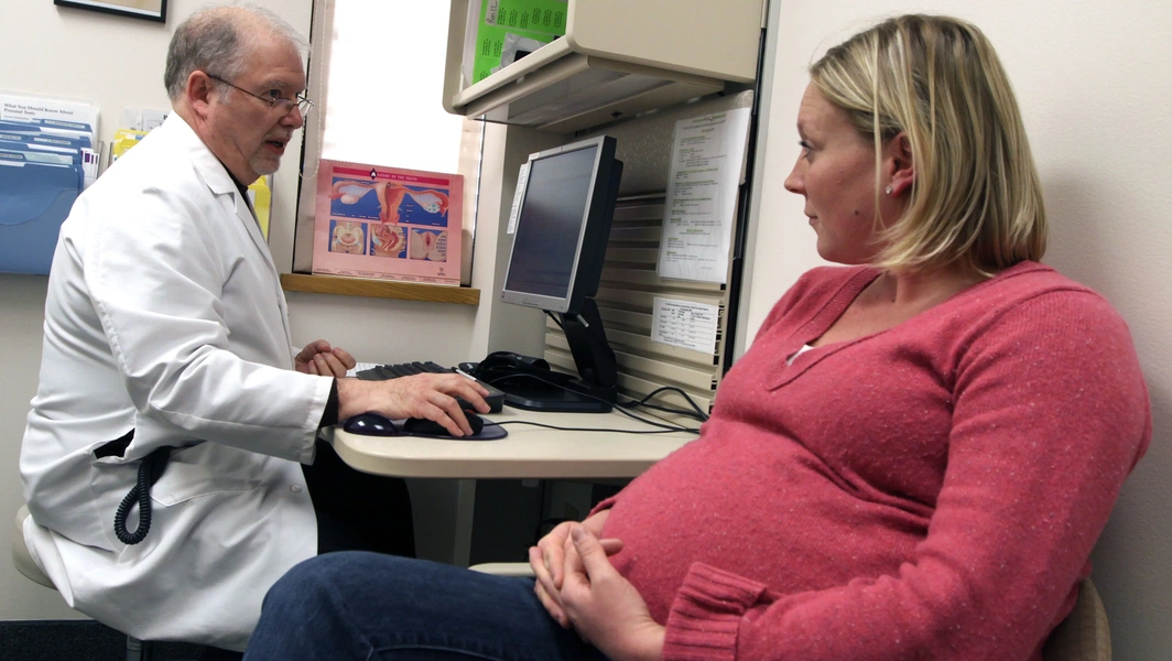 Study links less sitting and yoga to healthier pregnancies