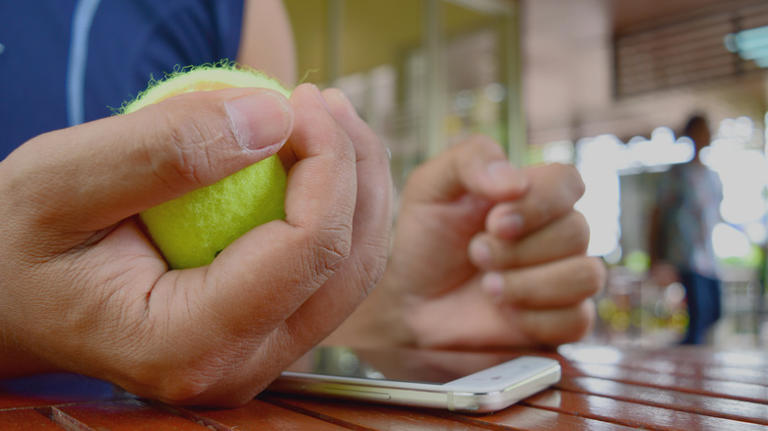 The tennis ball exercise that can check your grip strength (and your ...