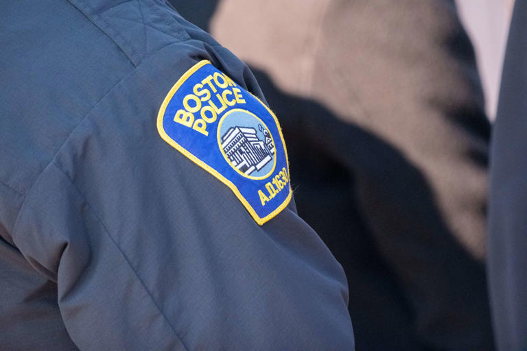 Police investigating dead body found across street from Boston high school