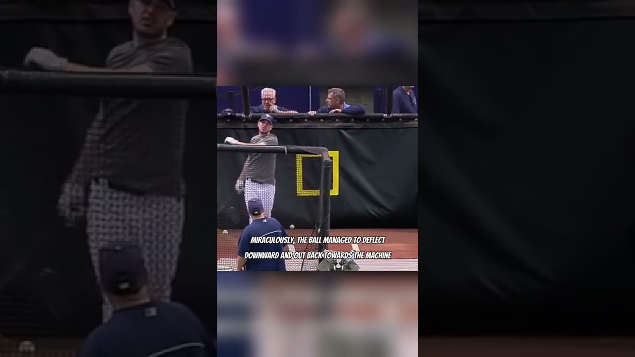 Batter hits ball back into pitching machine on the fly