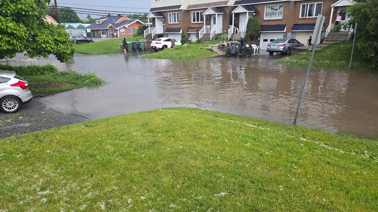 Heavy rains flood homes and streets in Montreal's West Island