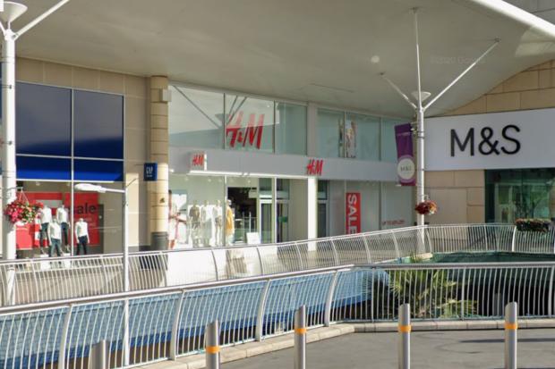 Man arrested after allegedly taking photos of women in changing rooms