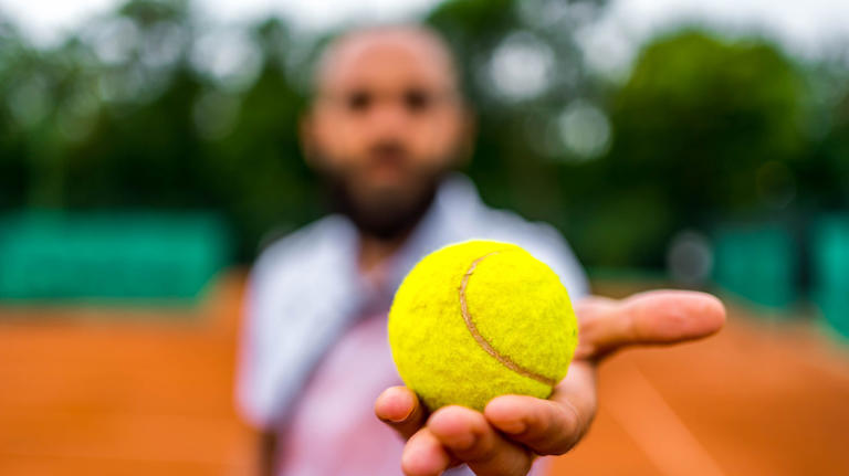 The tennis ball exercise that can check your grip strength (and your ...
