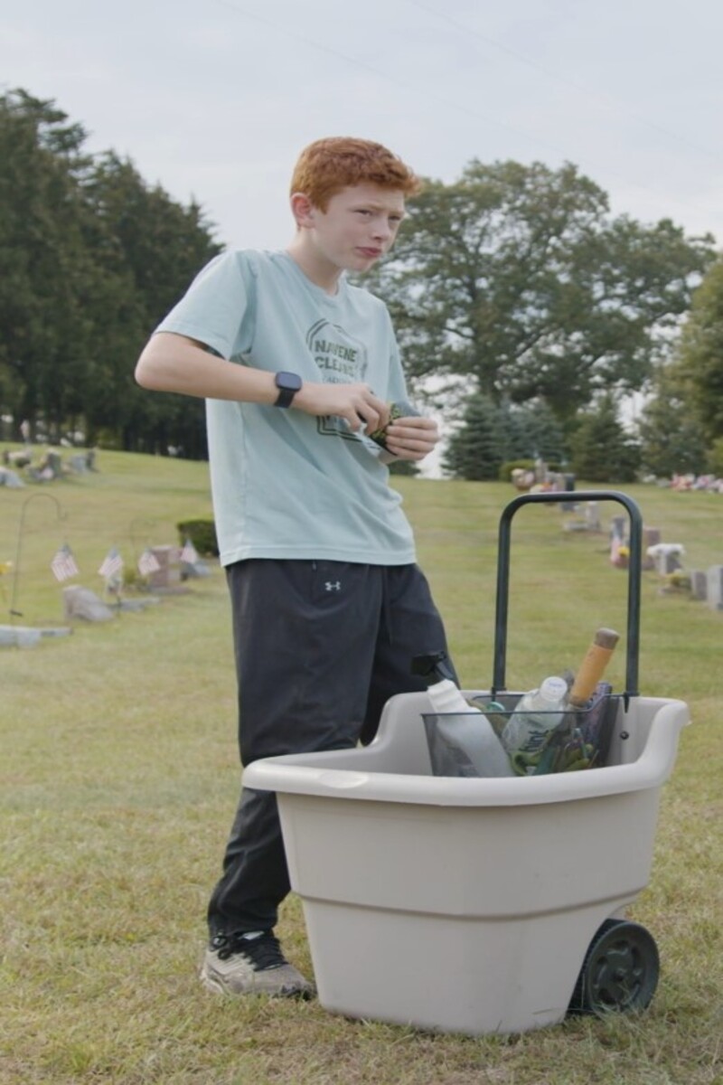 Young headstone cleaner making a difference