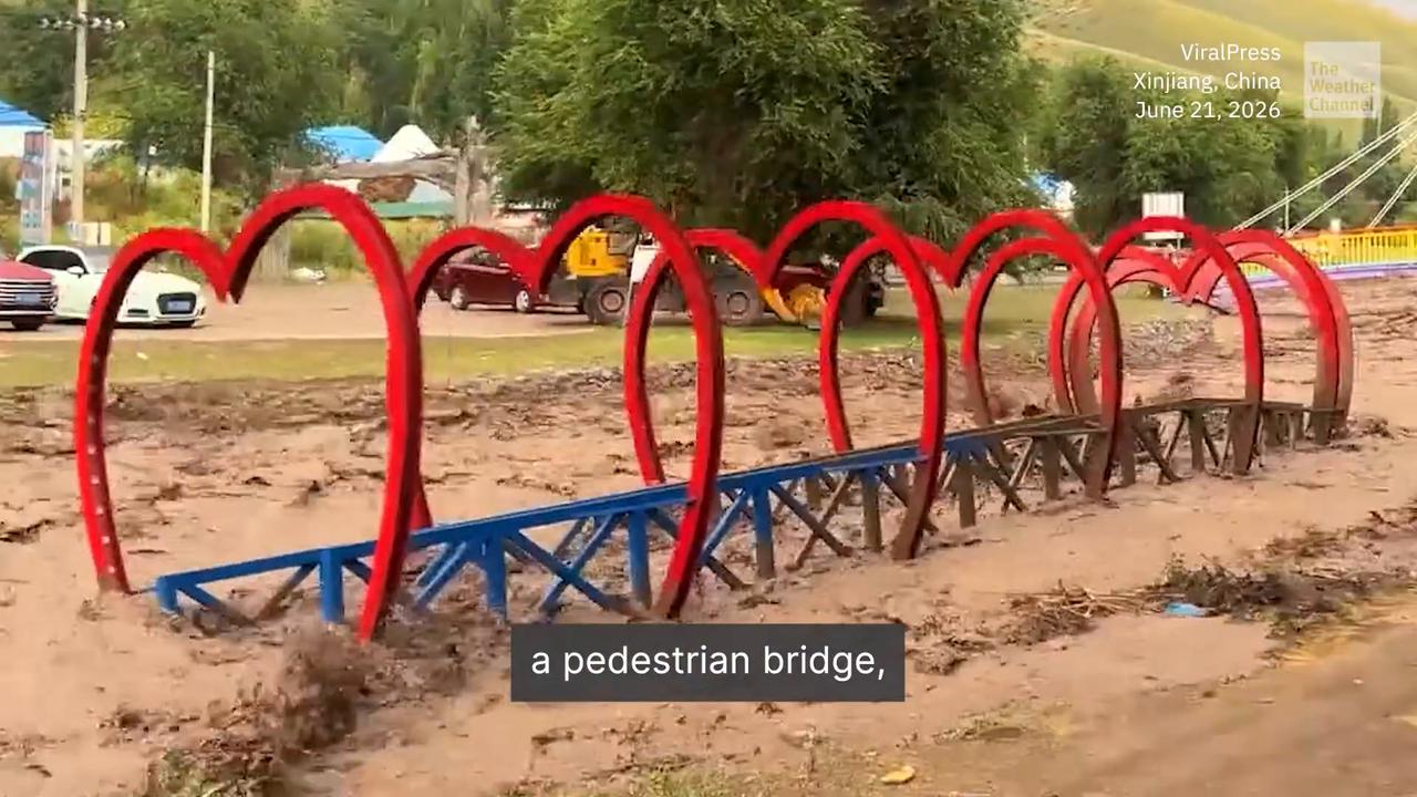 Watch: Flash flood washes away heart-shaped bridge