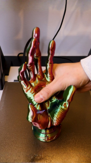 Alien hand 3D printed controller holder every gamer wants
